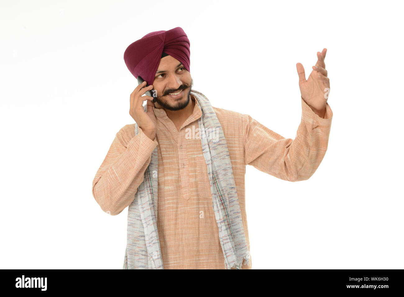 Rural man talking on mobile phone Stock Photo - Alamy