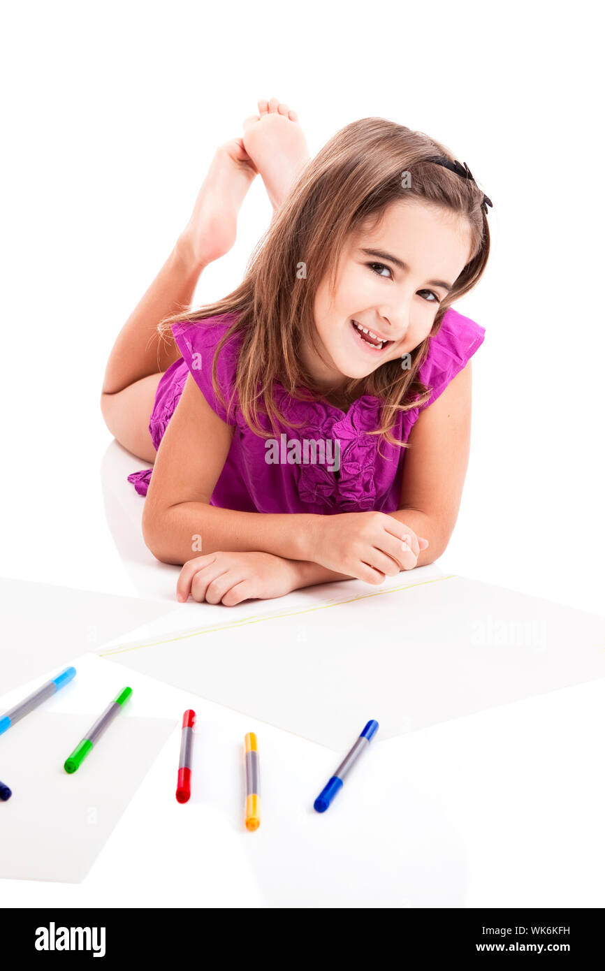 Girl sitting on floor and making drawings on paper Stock Photo - Alamy