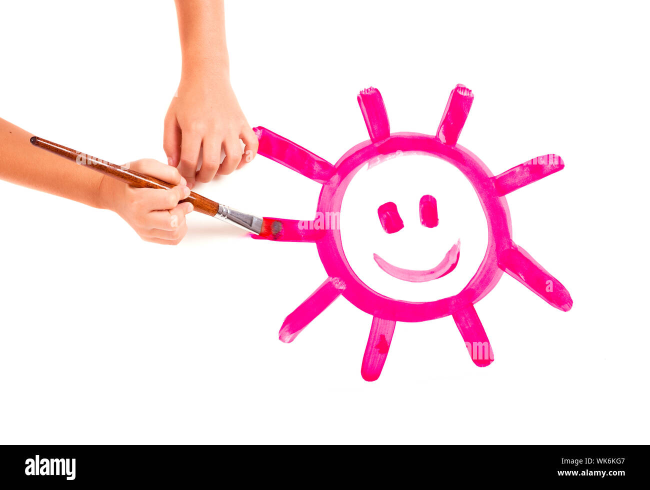 Child hands painting a happy sun, isolated on white Stock Photo - Alamy