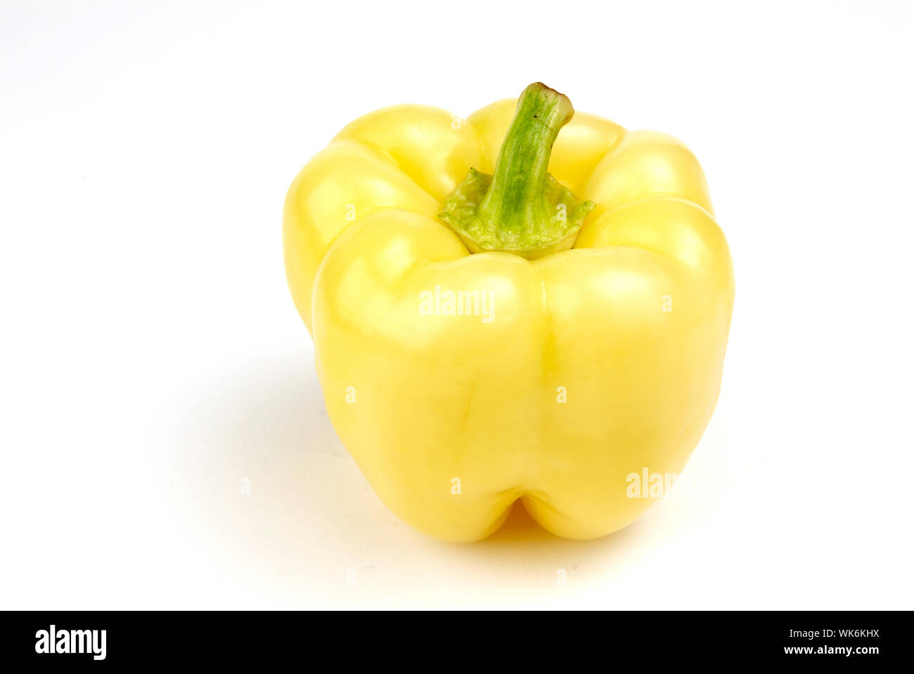 One yellow pepper isolated on white Stock Photo - Alamy