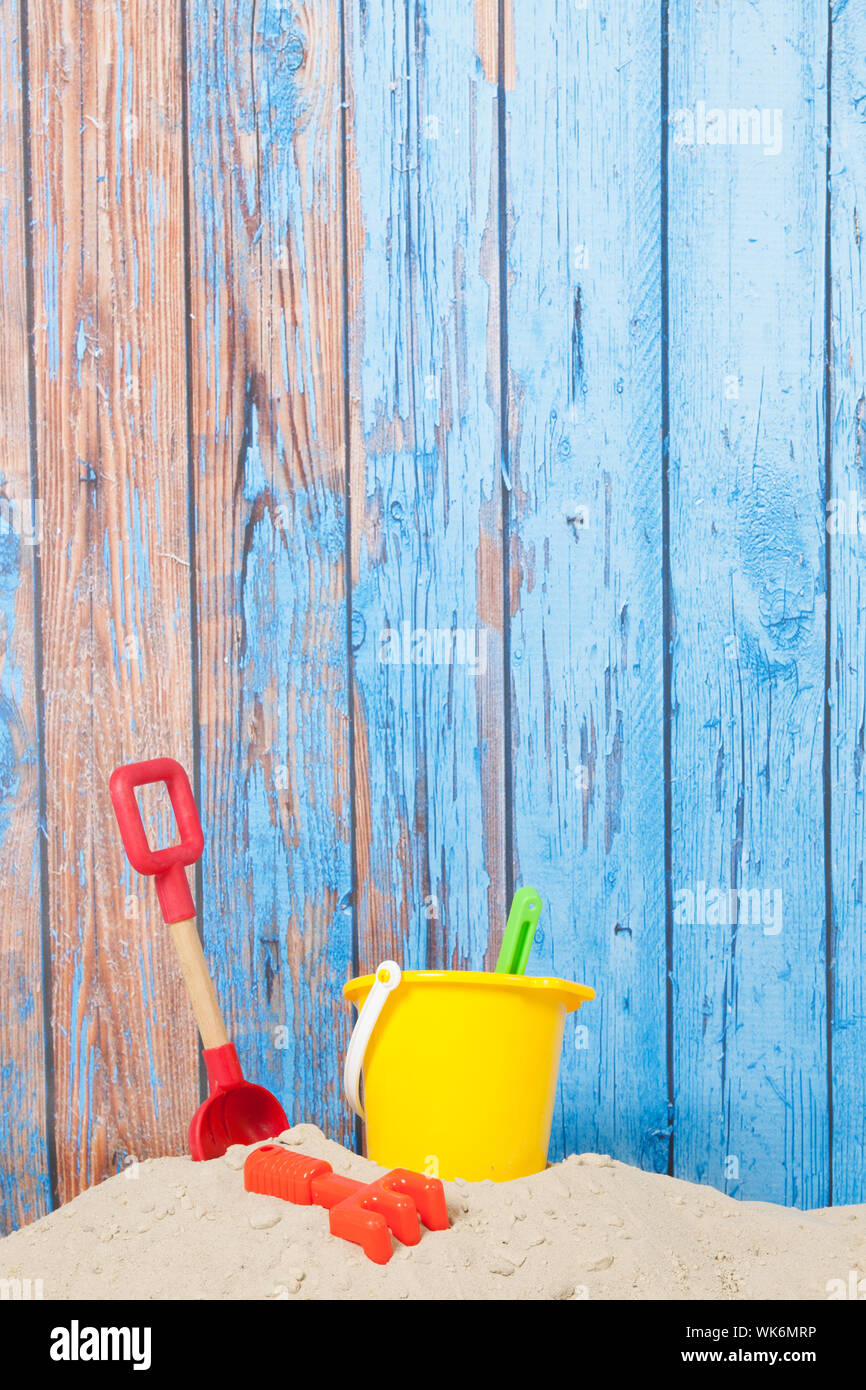 Toys in sand at the beach Stock Photo - Alamy