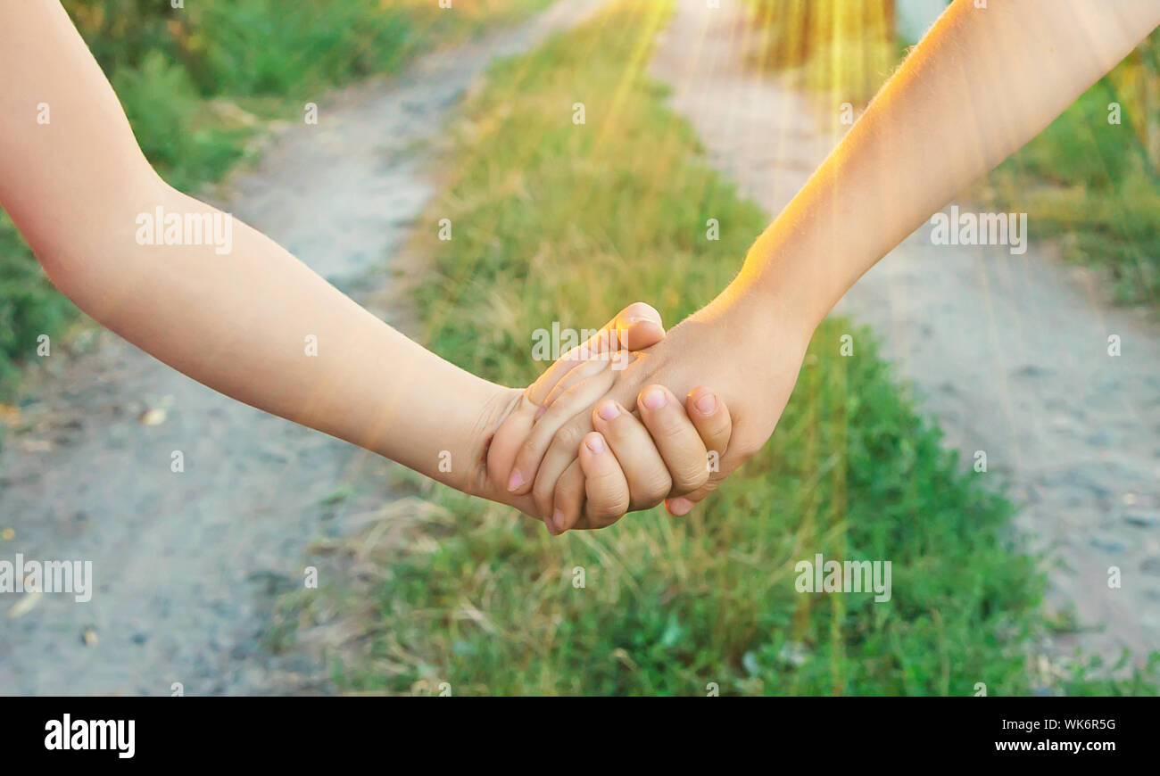 Diverse children holding hands isolated hi-res stock photography and ...