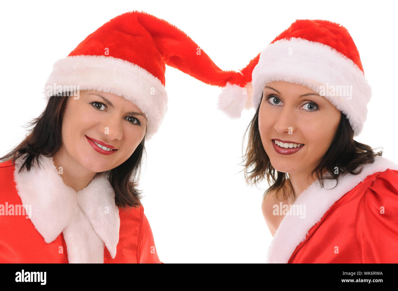 two woman santa isolated on white background Stock Photo - Alamy