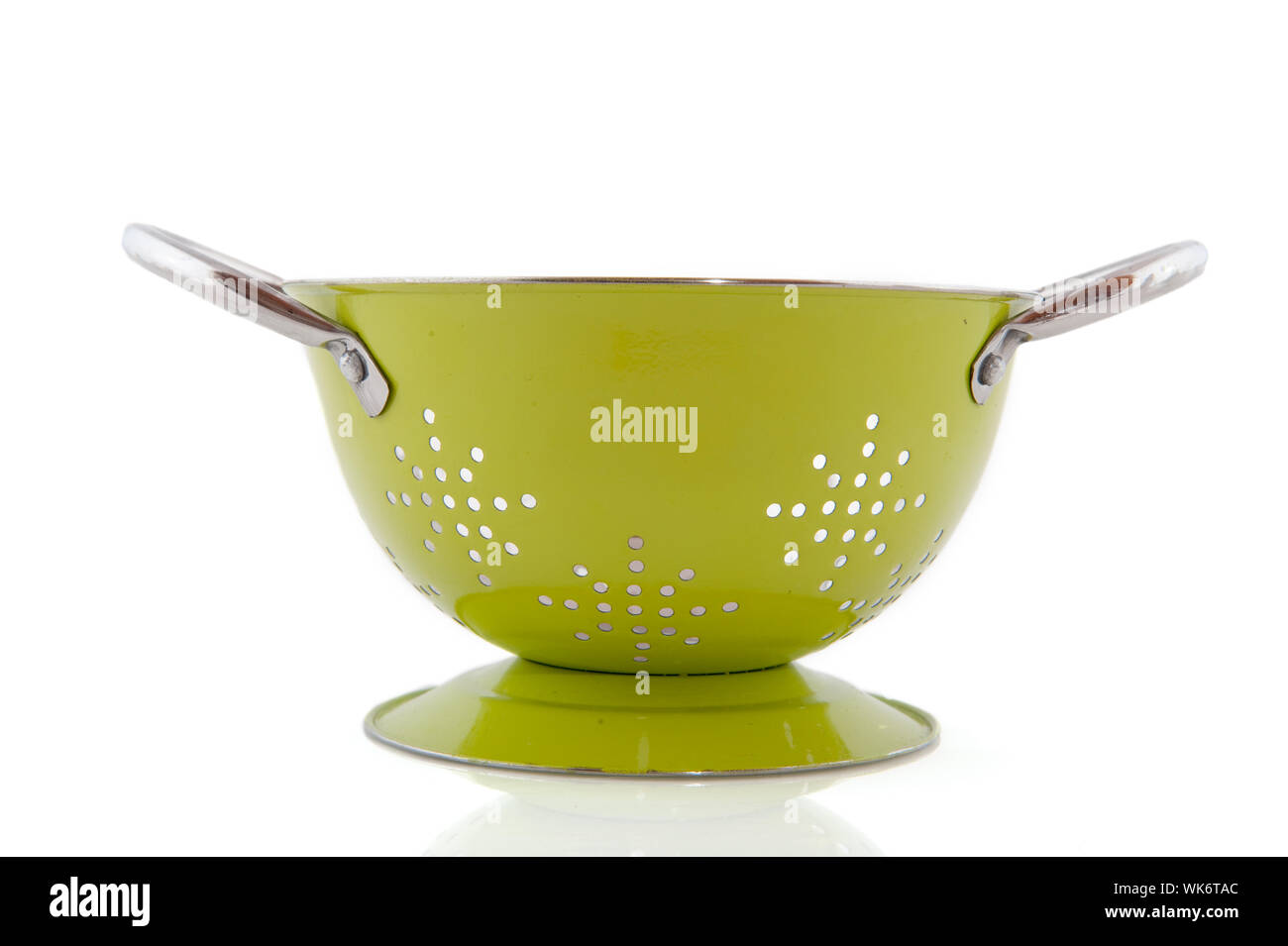 Green colander as kitchen equipment isolated over white Stock Photo - Alamy
