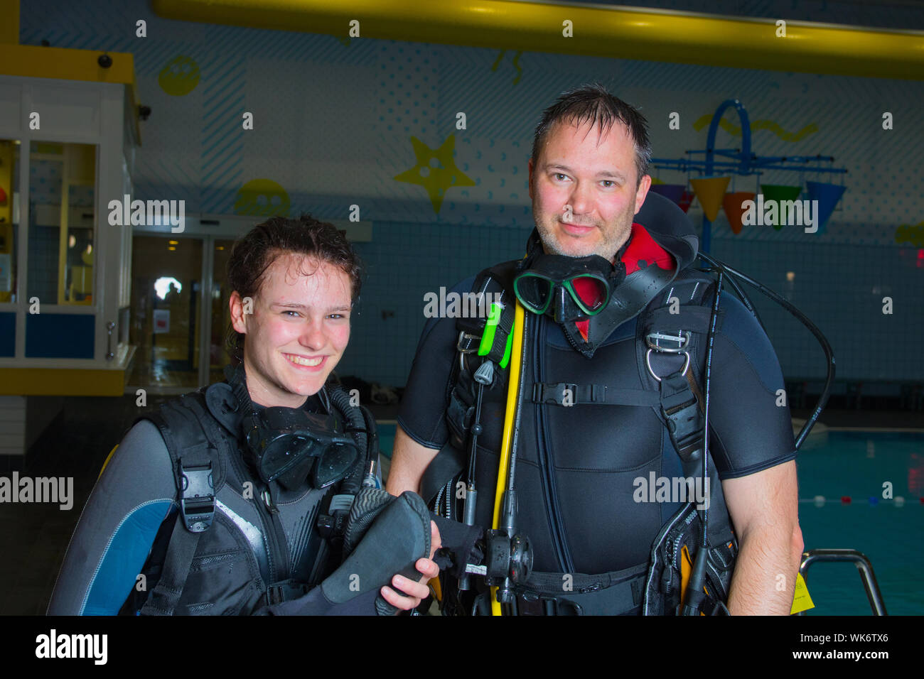 Female diver diving pool mid hi-res stock photography and images - Alamy
