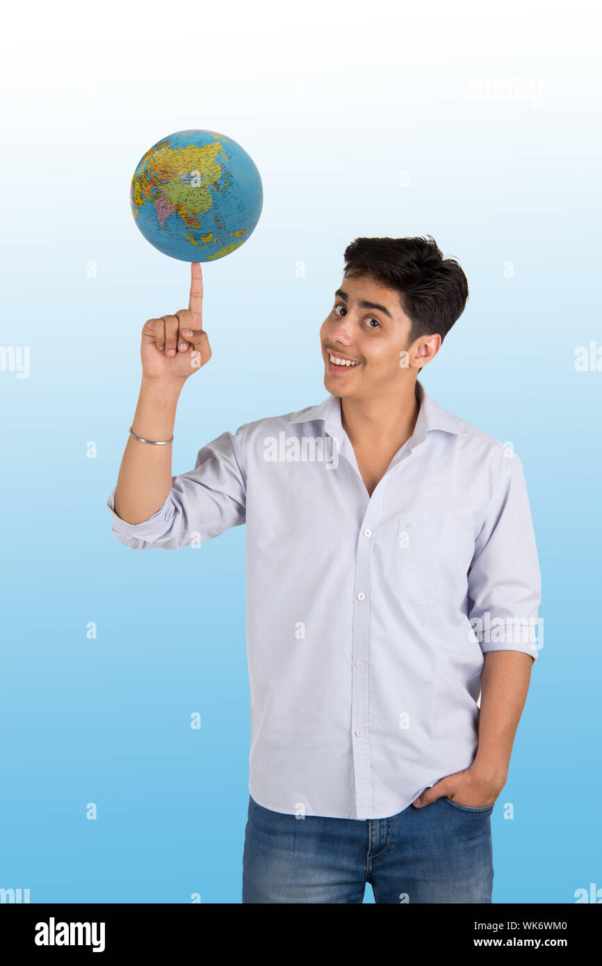 Spinning world on finger hi-res stock photography and images - Alamy