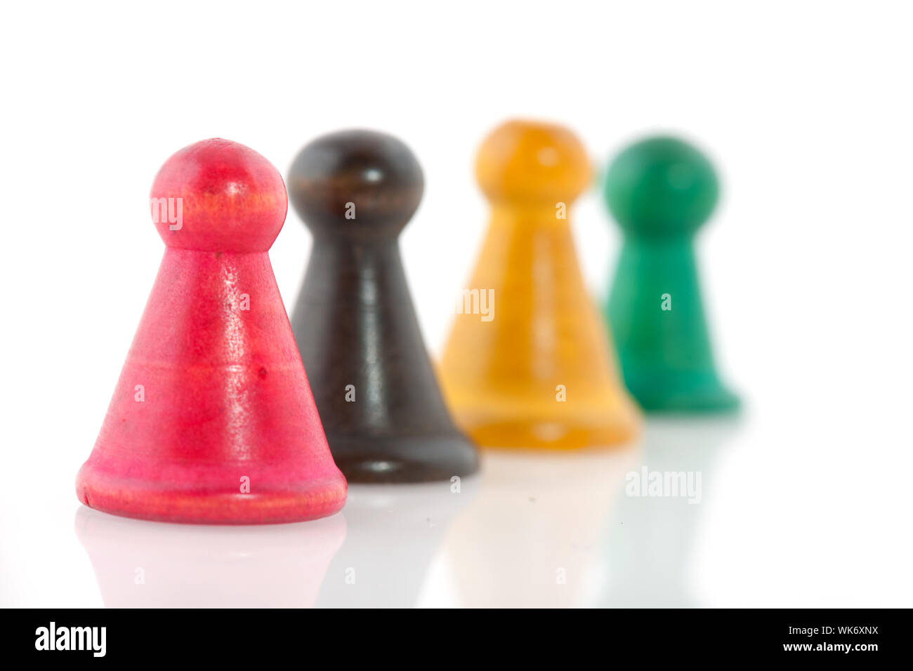 Four vintage pawns in different colors isolated over white Stock Photo ...