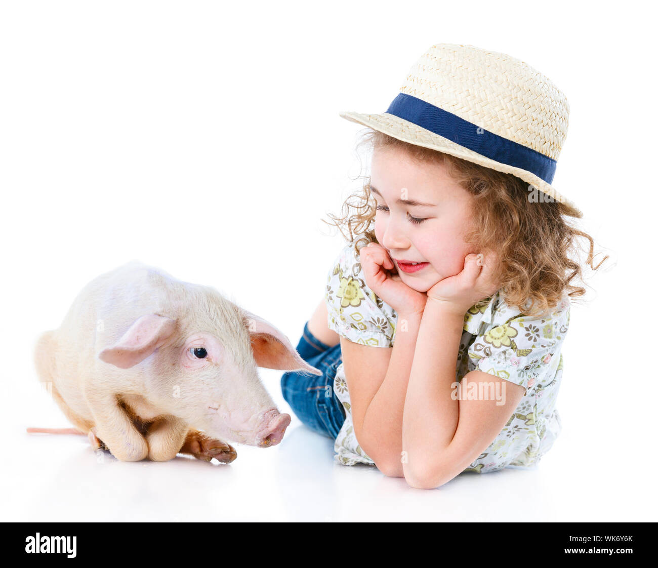 Girl feeding pig hi-res stock photography and images - Alamy