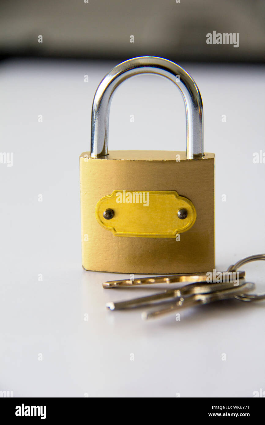 Padlock with key Stock Photo - Alamy