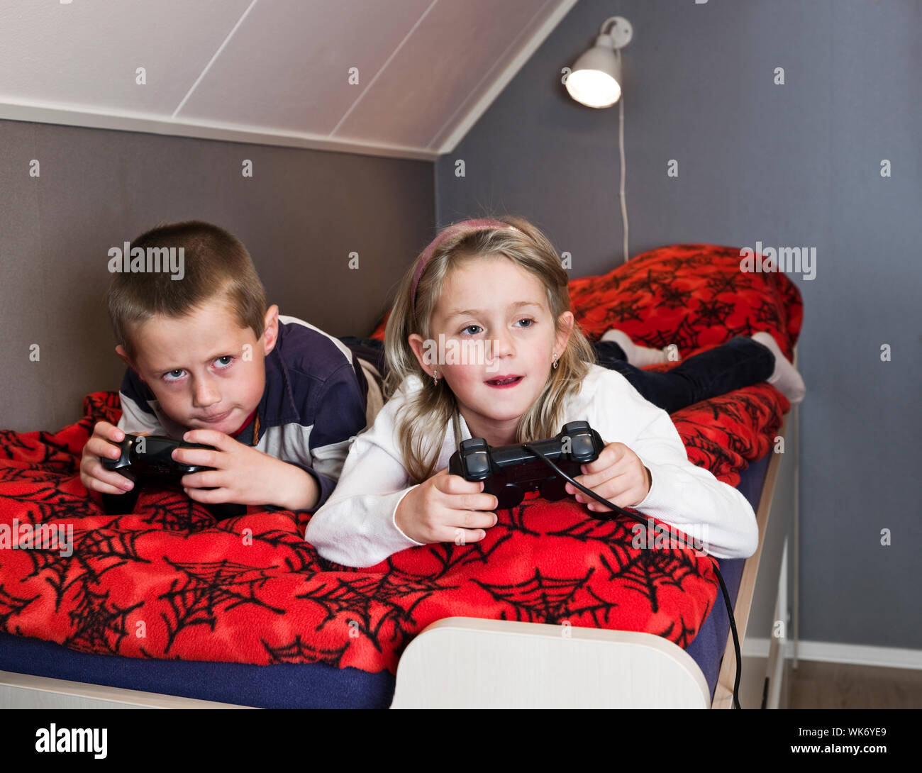 Playing xbox child hi-res stock photography and images - Alamy