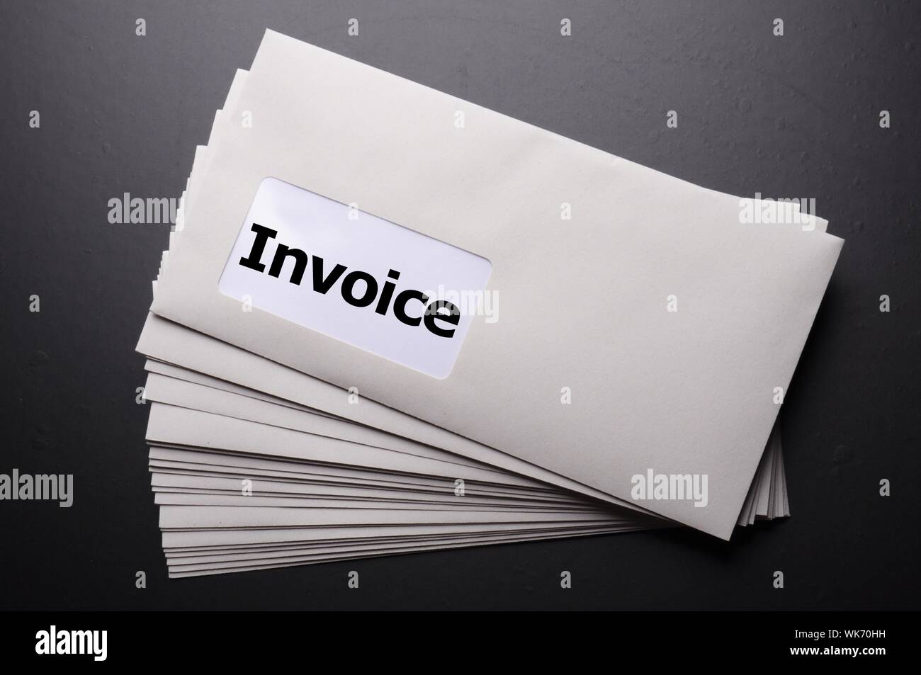 invoice mail concept with envelop showing business Stock Photo - Alamy