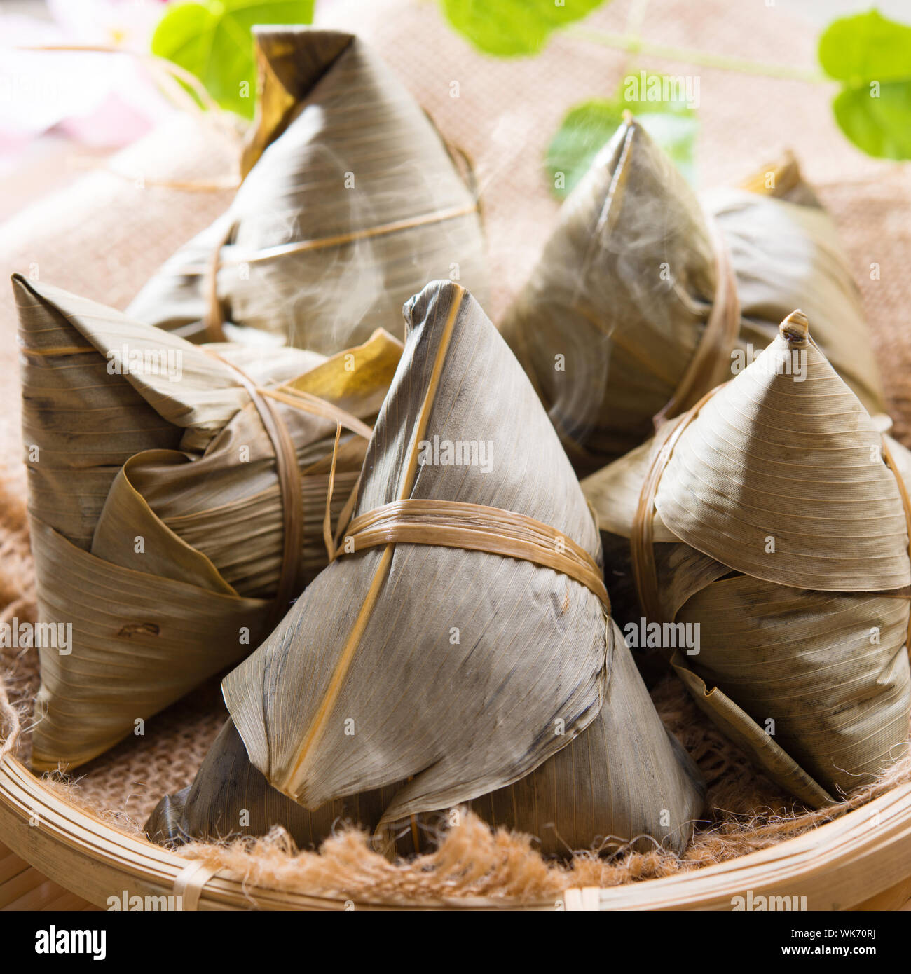 Rice dumpling or zongzi. Traditional steamed sticky glutinous rice ... Rice dumpling or zongzi. Traditional steamed sticky glutinous rice ...
