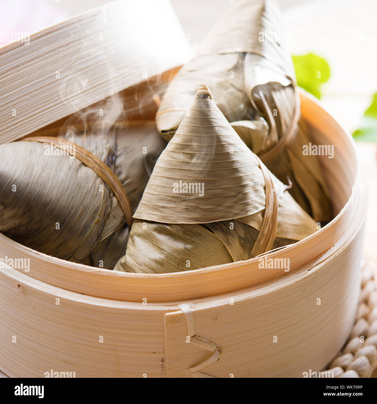 Hot rice dumpling or zongzi. Traditional steamed sticky glutinous rice ...