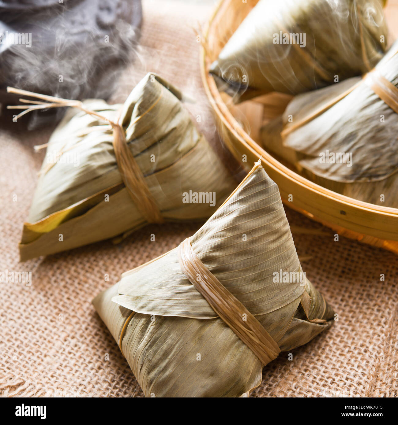 Traditional steamed sticky glutinous rice dumplings. Hot rice dumpling ...