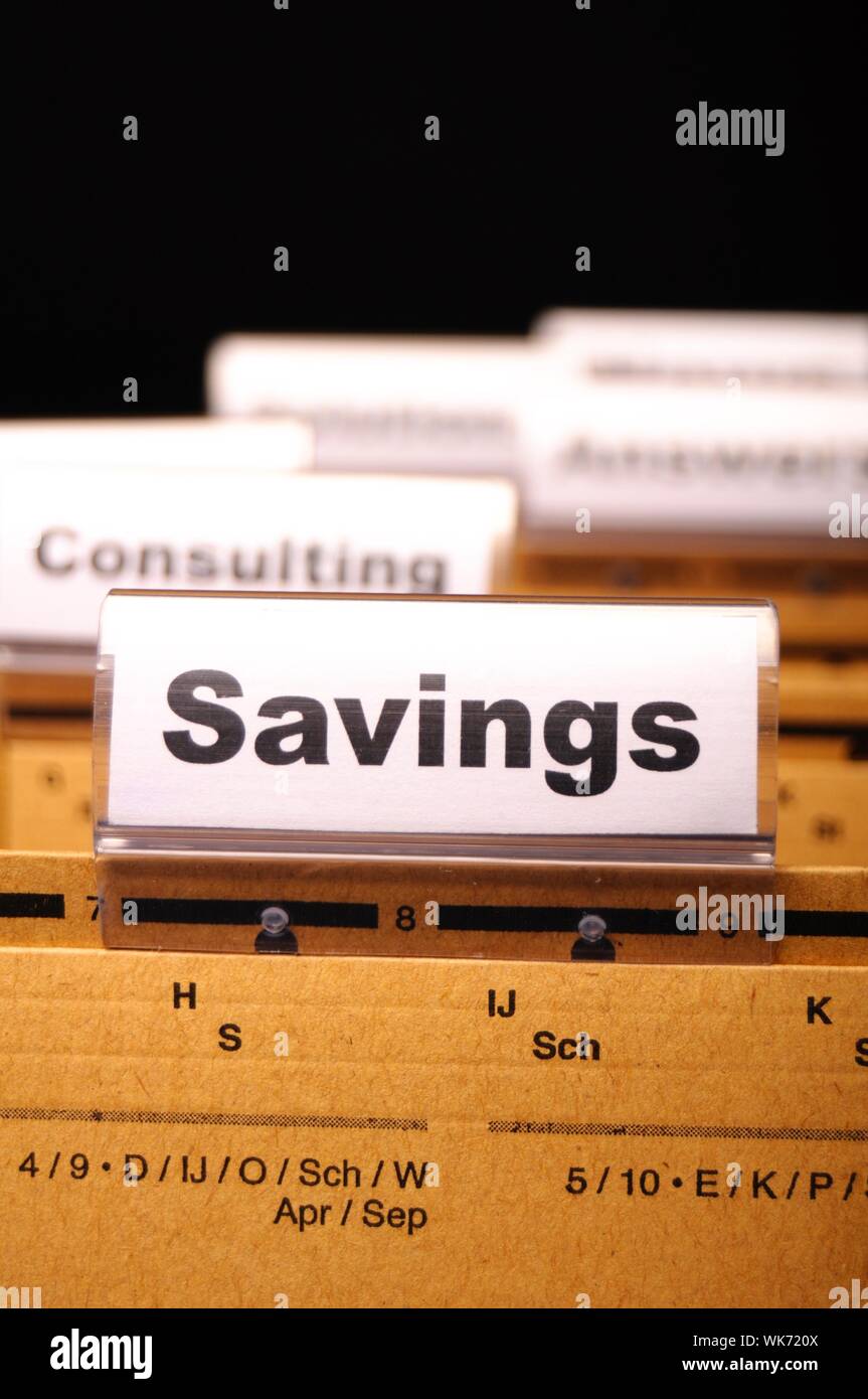 savings word on business folder showing saving money concept Stock ...