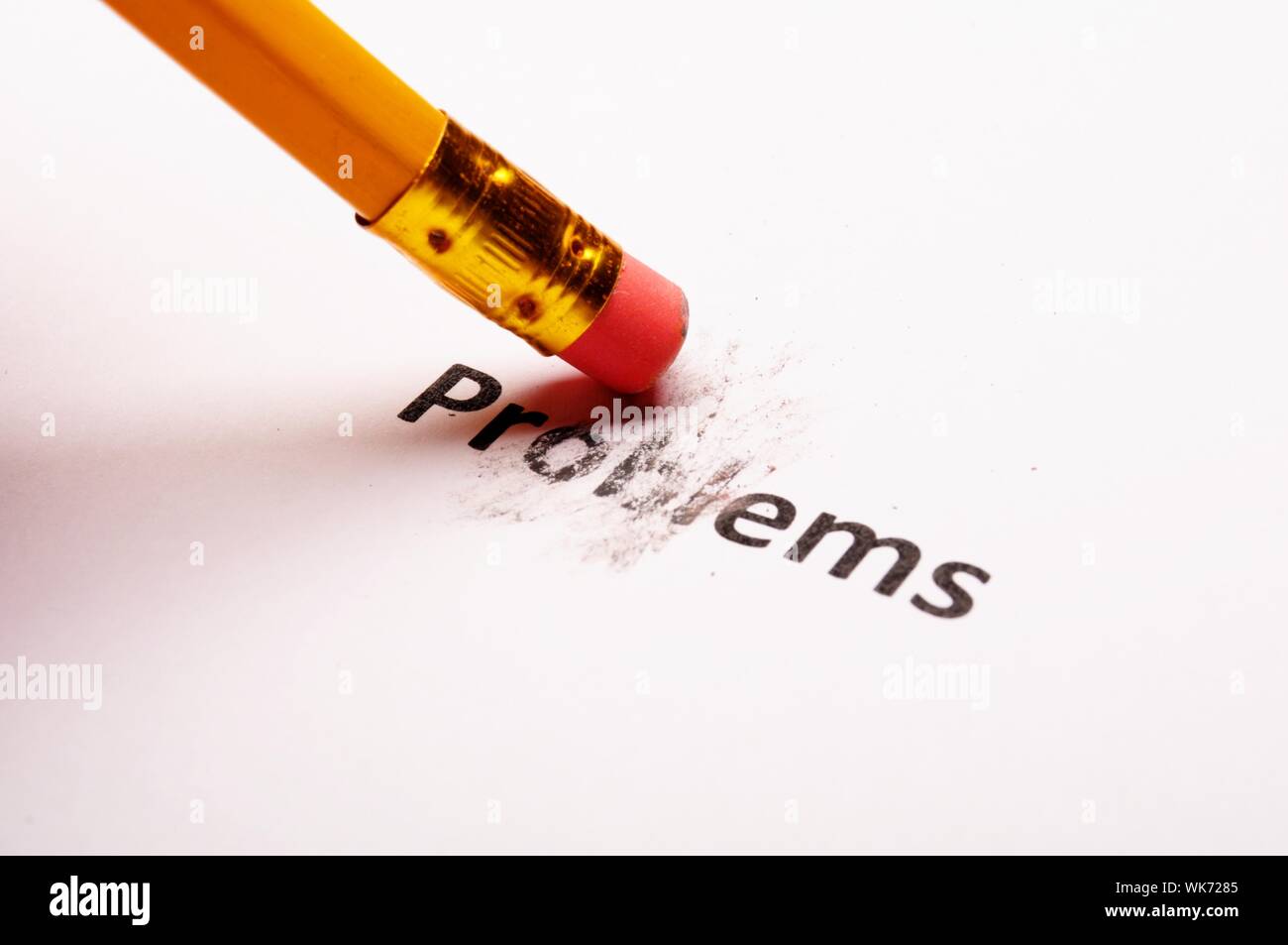 problems or solutions concept with pencil and eraser on white paper ...