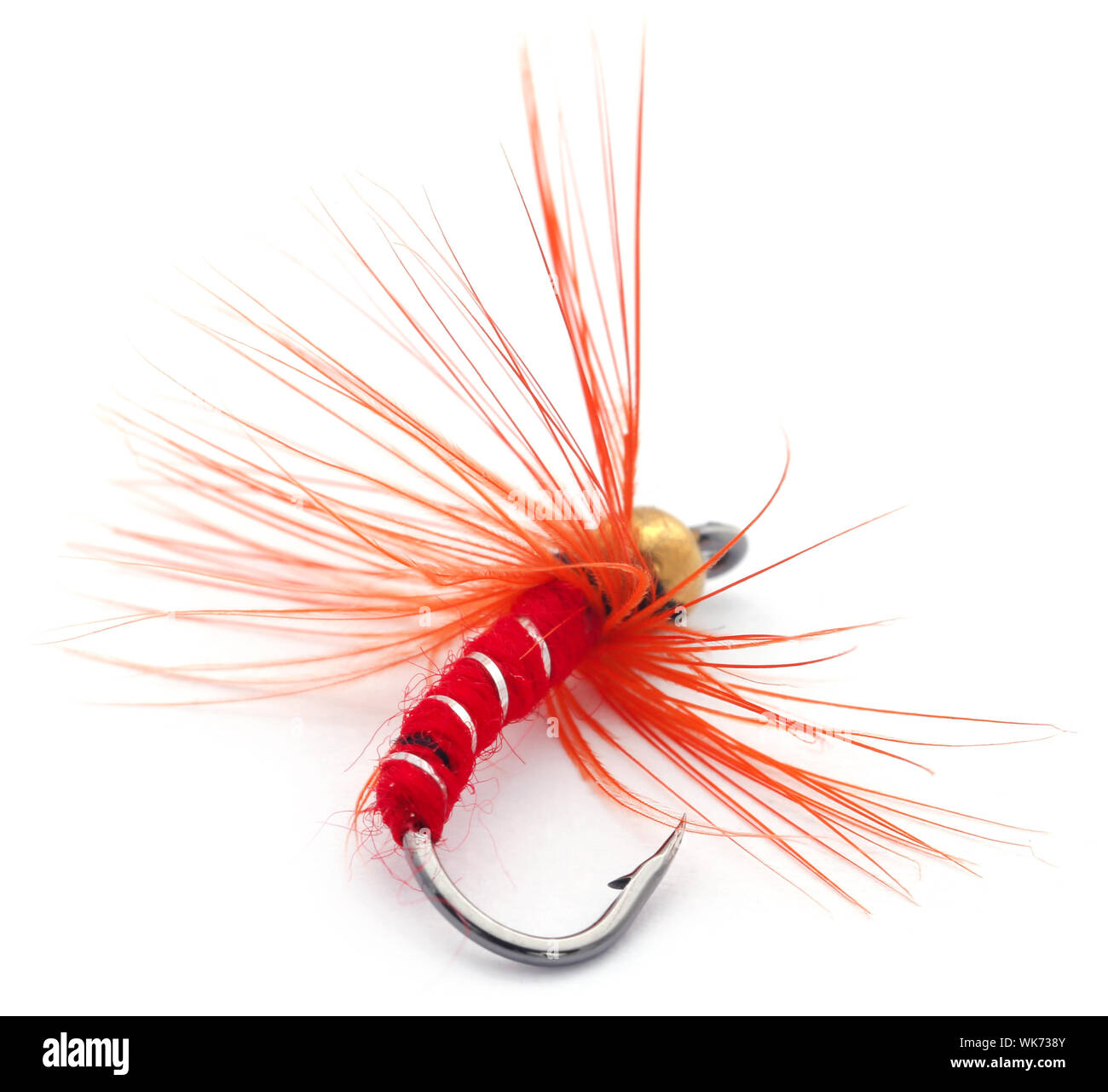 Fishing fly with hook over white background Stock Photo - Alamy