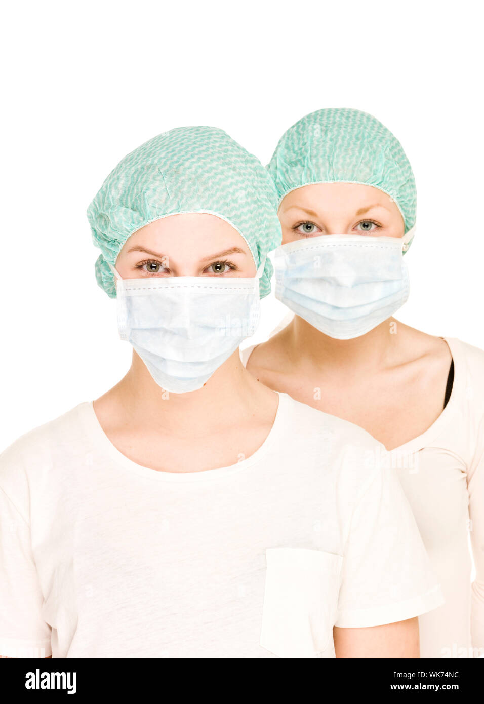 Two Female nurses isolated on white background Stock Photo - Alamy