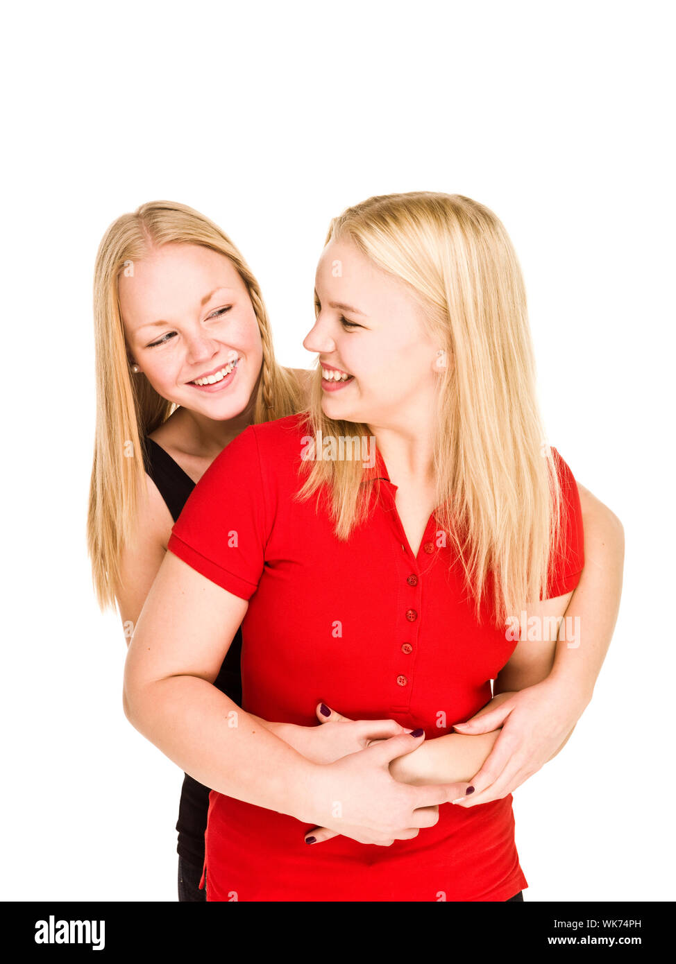 Two bonding Girls isolated on white background Stock Photo - Alamy