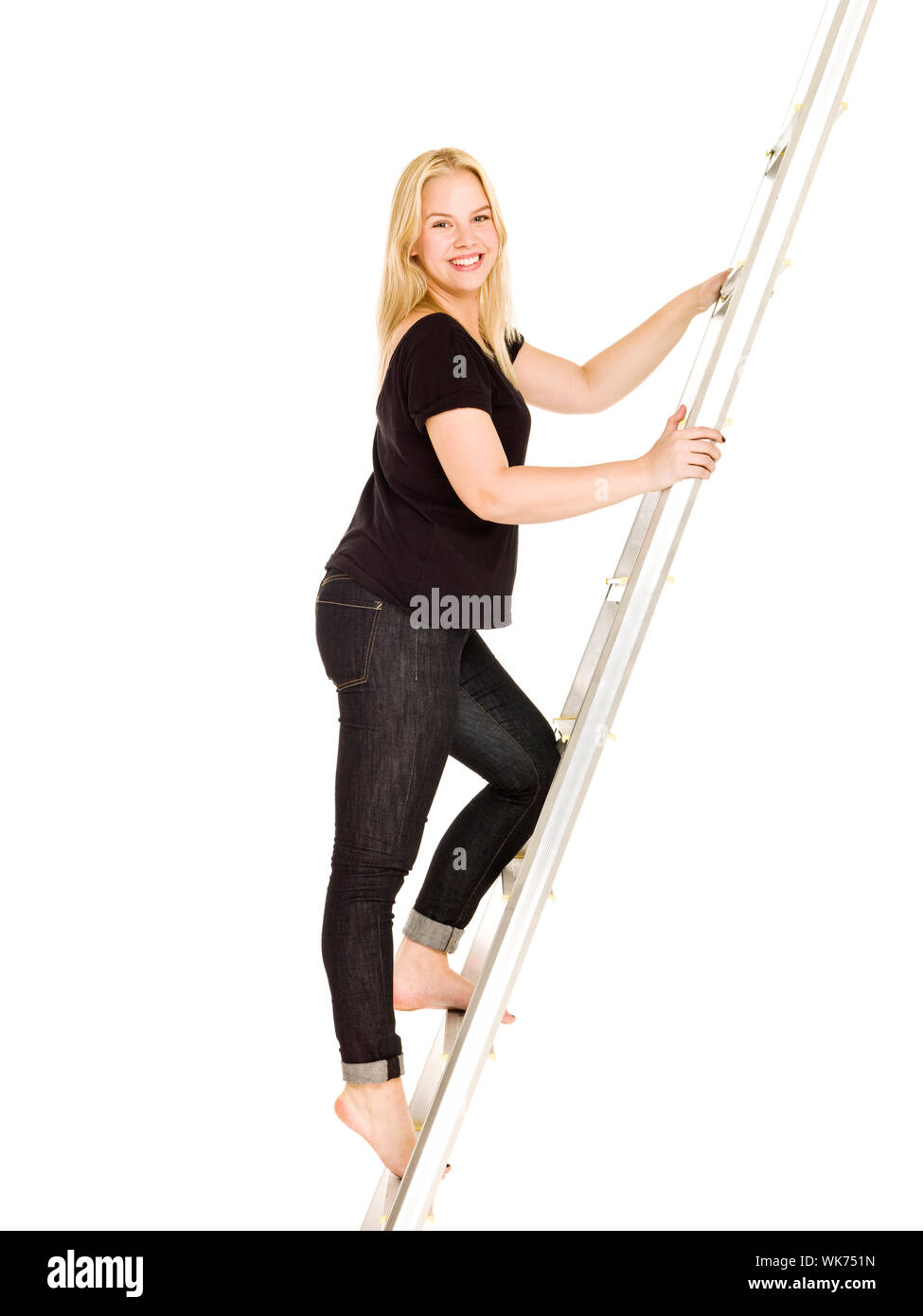 Woman climbing up the ladder isolated on white background Stock Photo ...