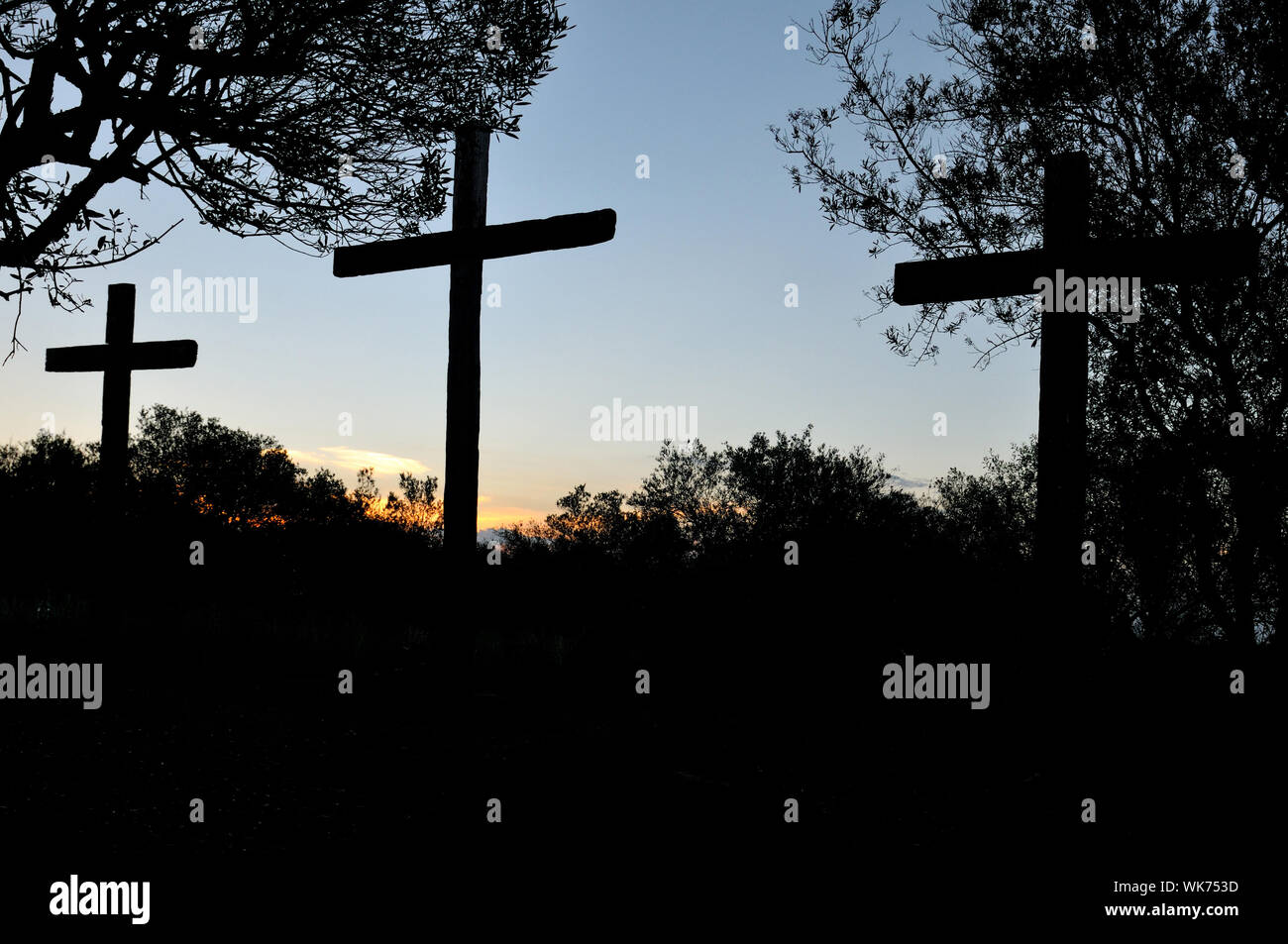 Silhouette of three crosses and trees at sunset Stock Photo - Alamy