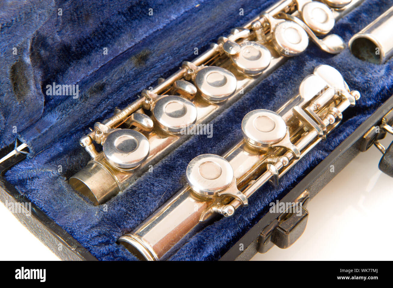 Black case with silver flute in blue velvet Stock Photo - Alamy