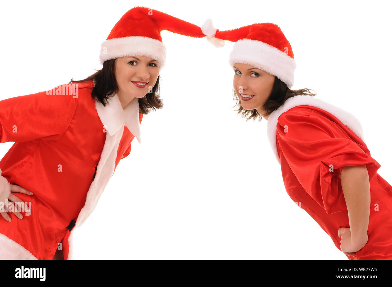two woman santa isolated on white background Stock Photo - Alamy
