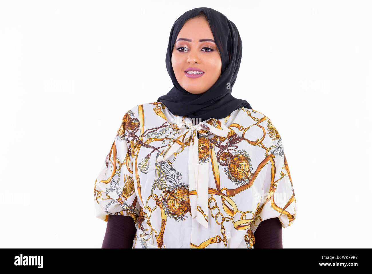 Happy young beautiful African Muslim woman thinking Stock Photo - Alamy
