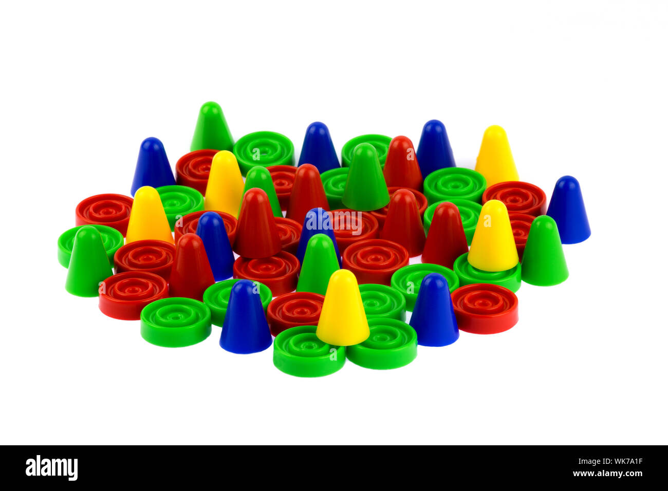 Coloured plastic board game tokens isolated on a white Background Stock ...