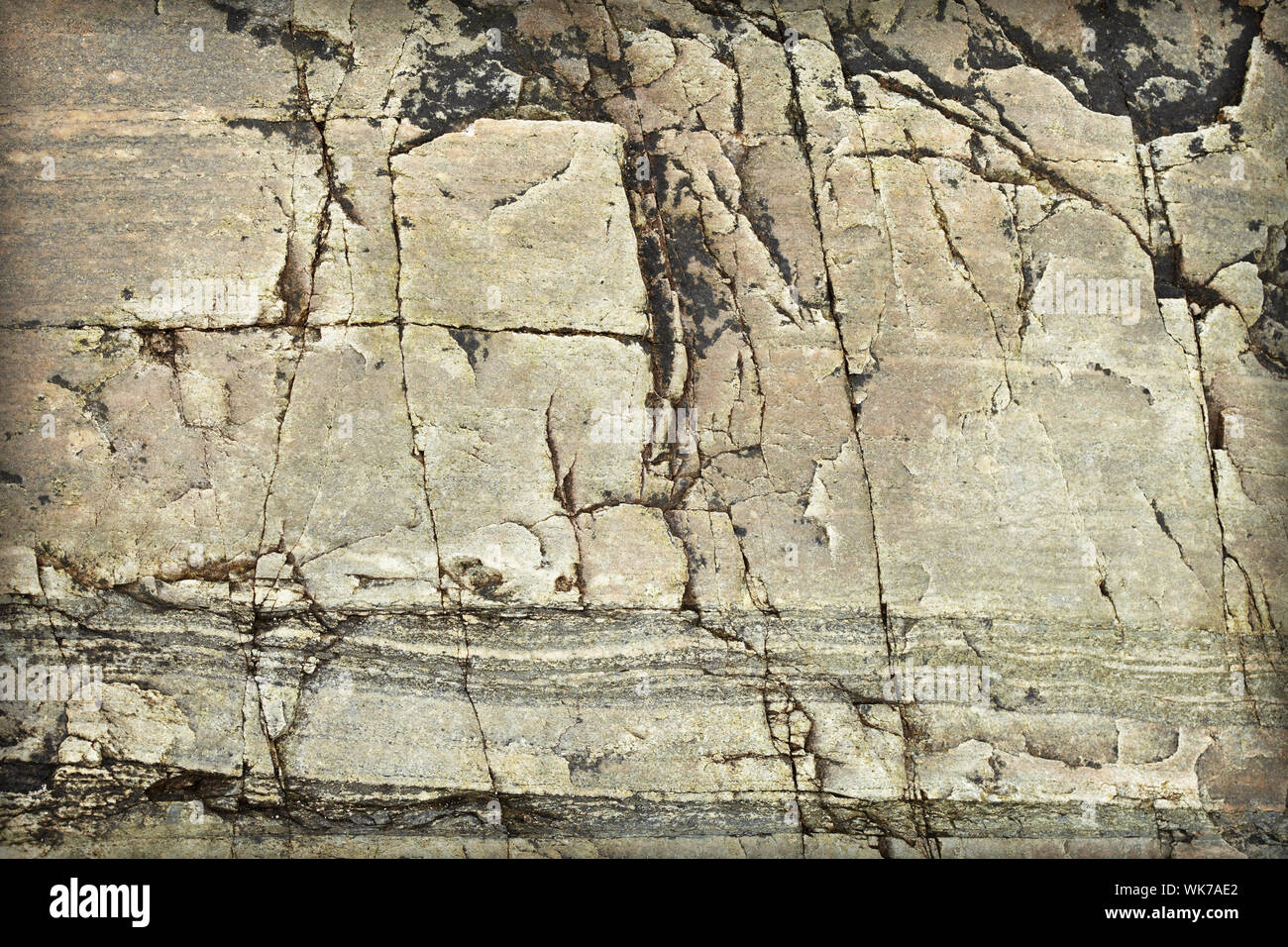 Surface of a natural stone with stains and cracks - a background Stock ...