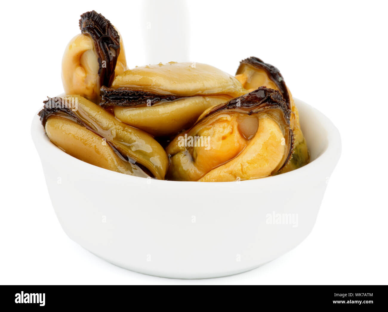 Gourmet Smoked Mussels with Olive Oil in White Bowl isolated on white ...