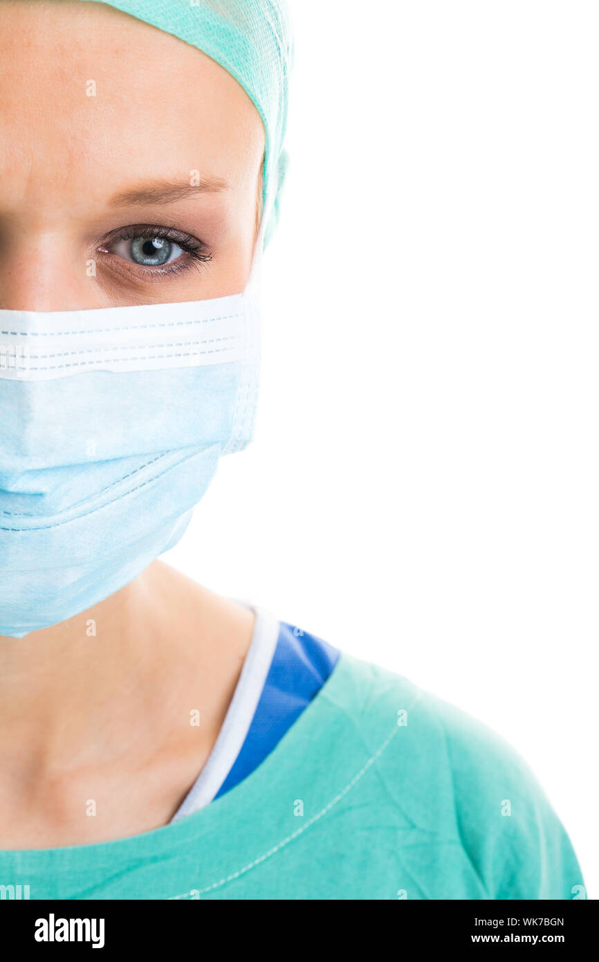 Portrait of a pensive/sad/exhausted female doctor/surgeon on white ...