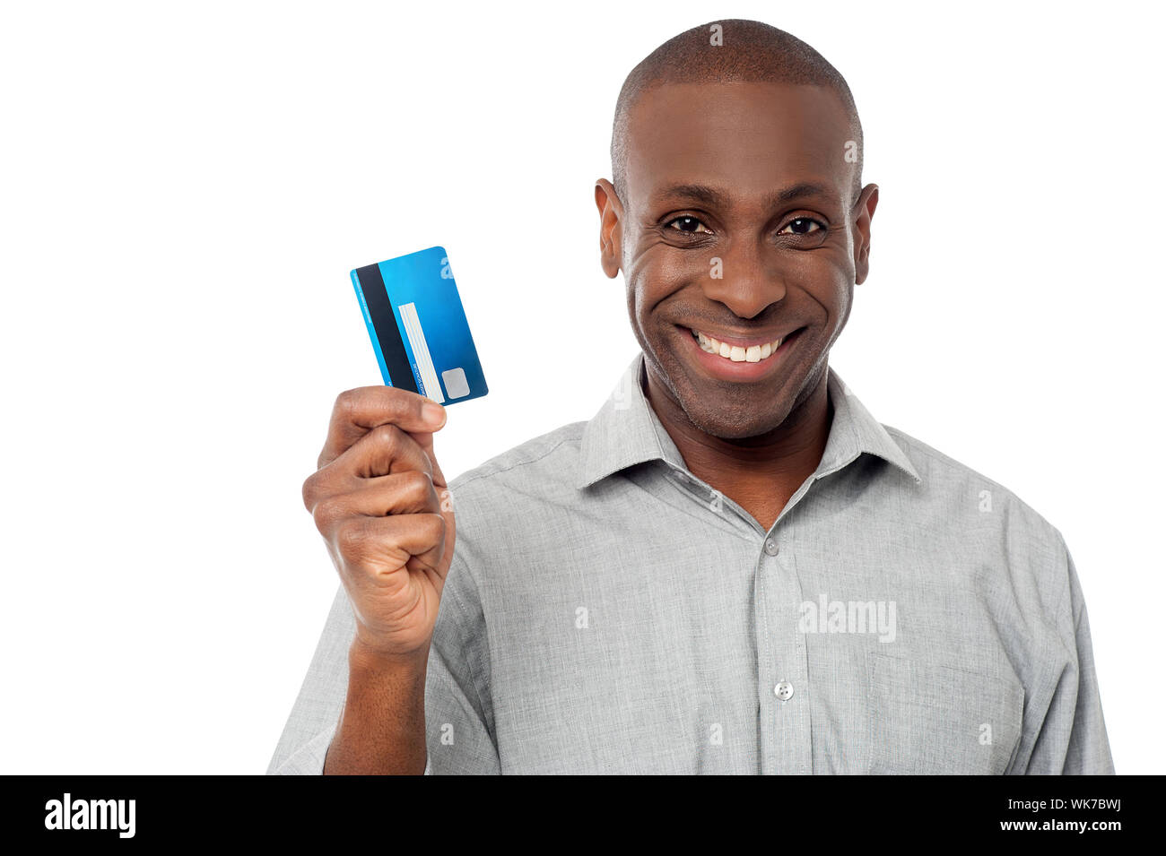 Handsome man showing his debit card to camera Stock Photo - Alamy