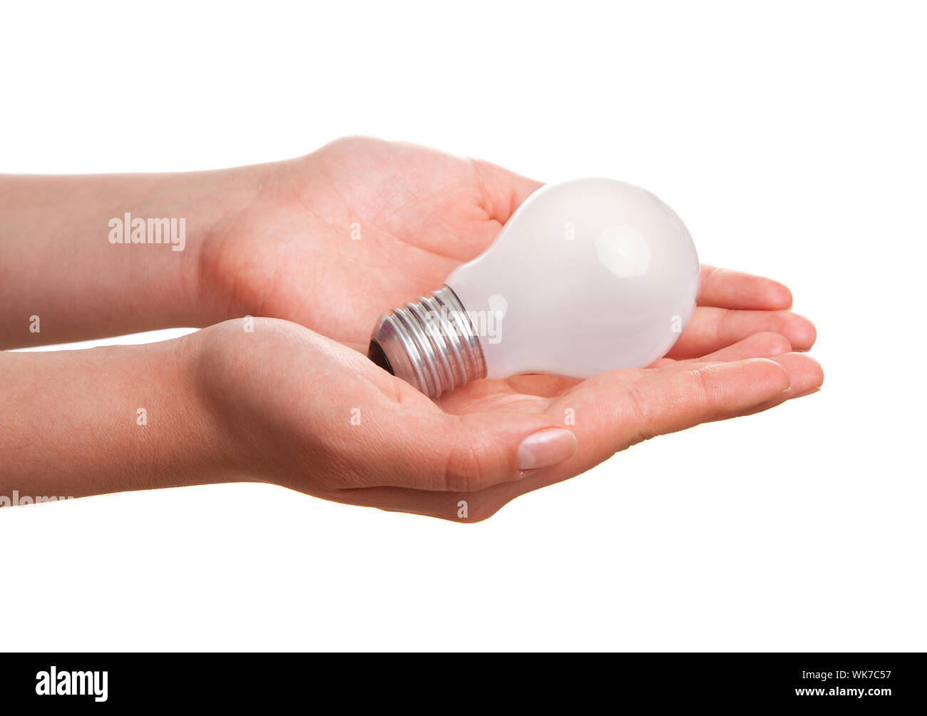 Light bulb in hand, isolated on white background Stock Photo - Alamy