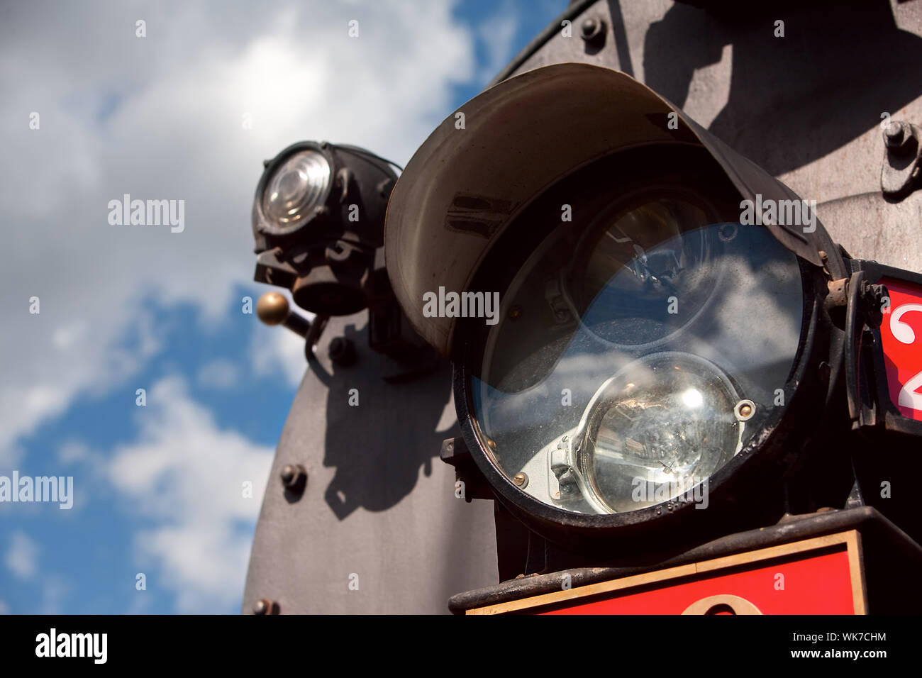 Light on the front of vintage steam engine train Stock Photo - Alamy