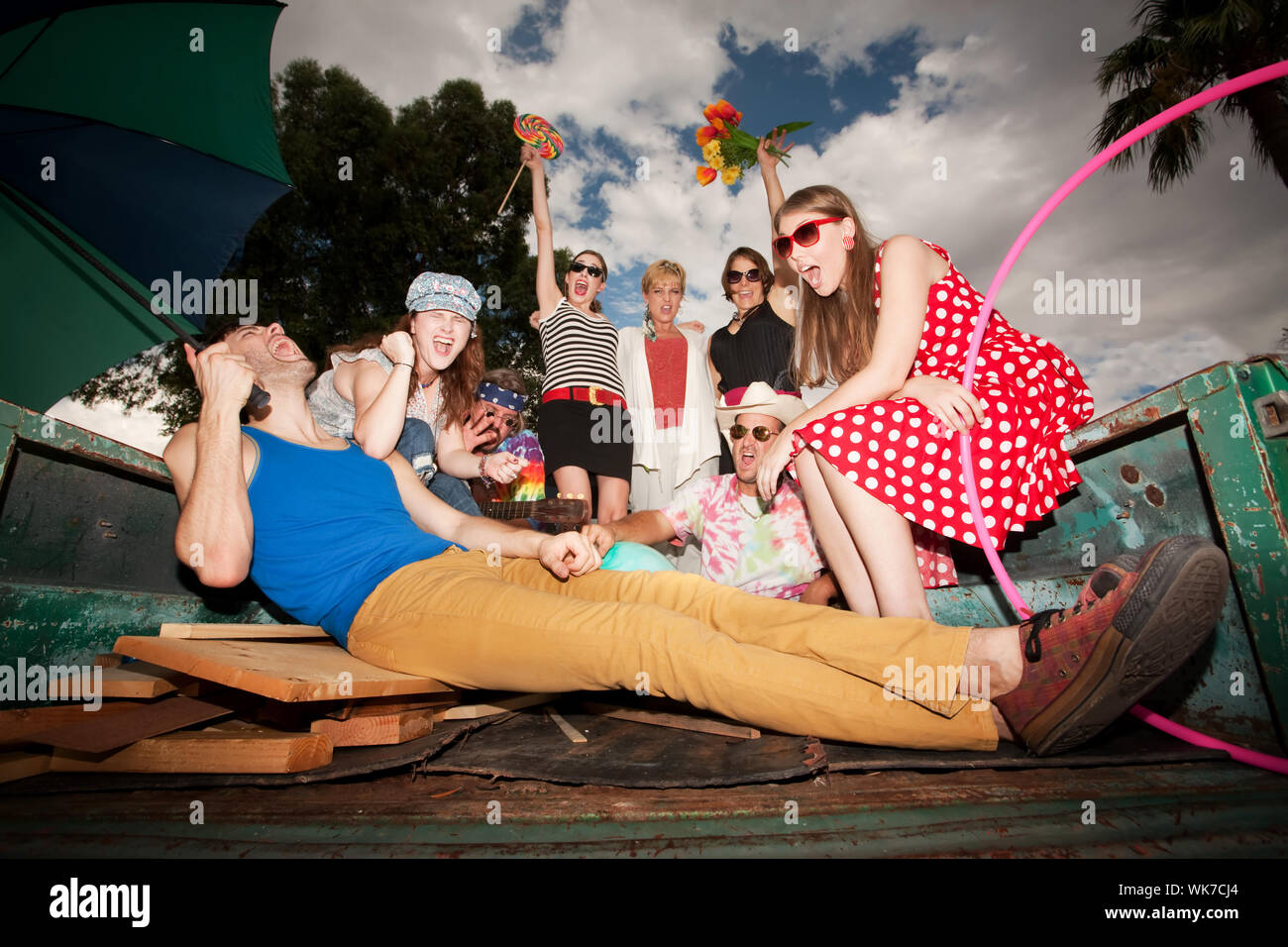 Groovy Group in the Back of Truck Making Noise Stock Photo - Alamy