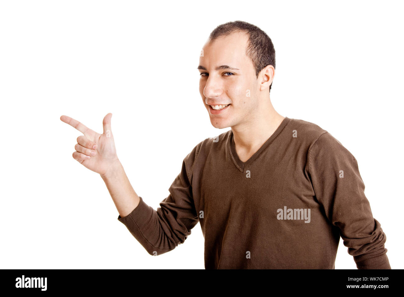 Portrait of a smart guy pointing to something, isolated on white Stock ...