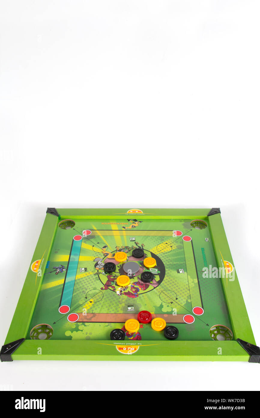 Carom board with carom pieces Stock Photo - Alamy