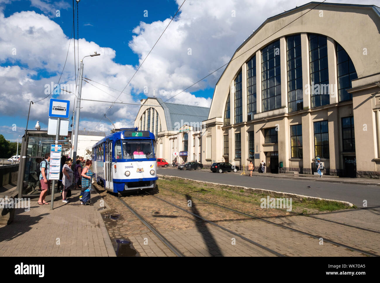 Latvia: Riga. Tram idle in front of the hangars of the Central Market ...