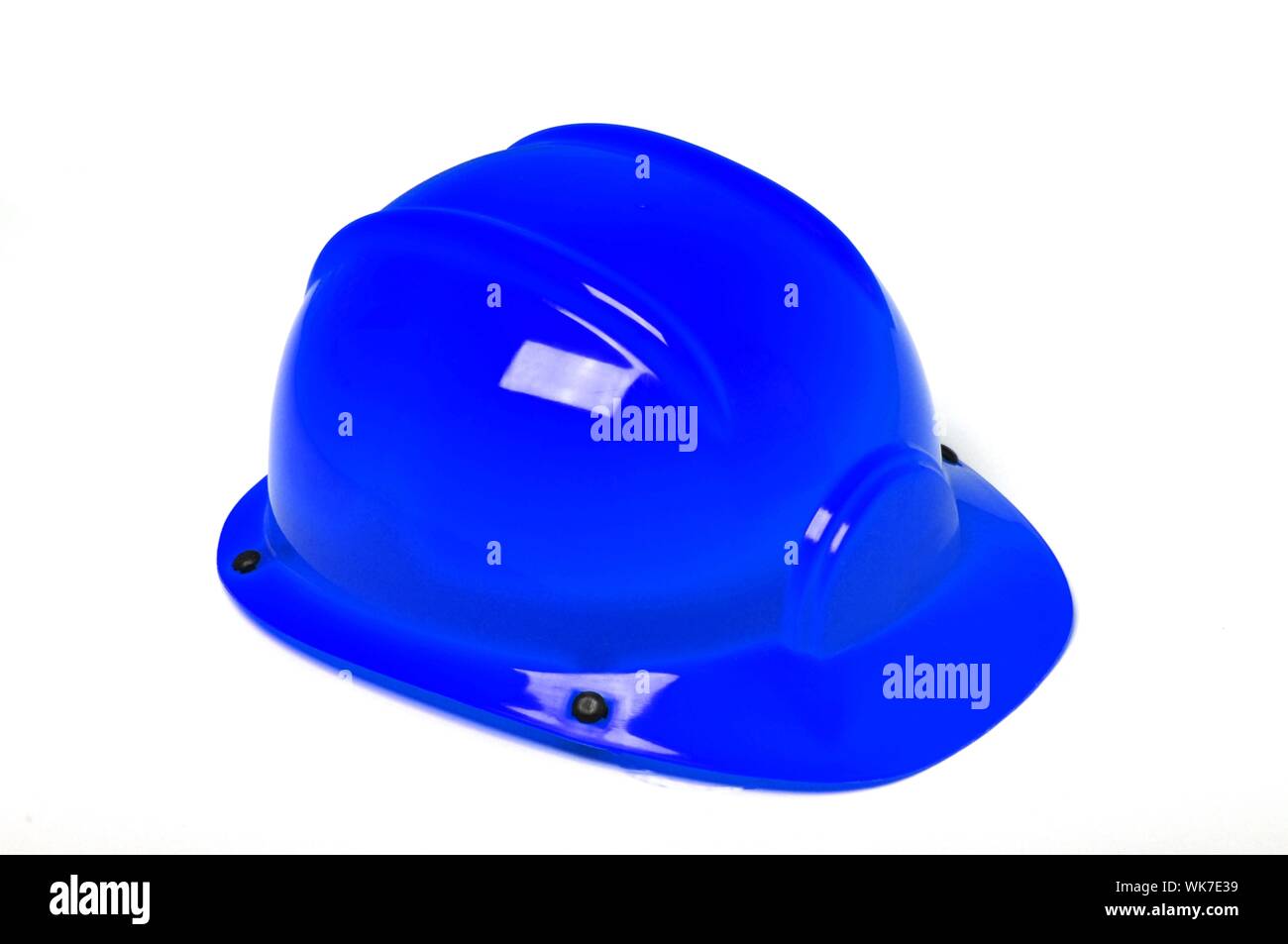 hard hat or construction helmet showing safety work concept Stock Photo ...