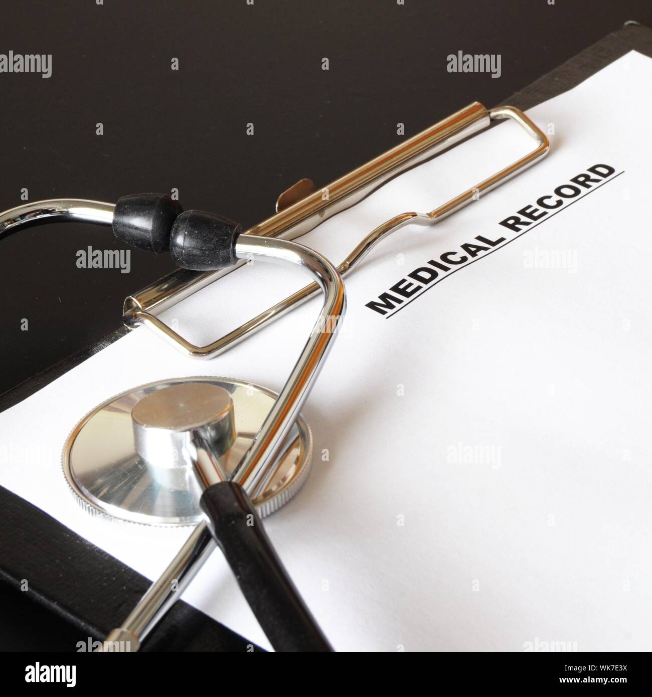 medical record clipboard and stethoscope showing health or medicine ...