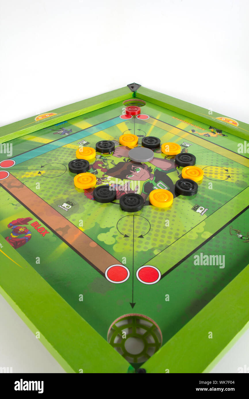 Carom board with carom pieces Stock Photo - Alamy