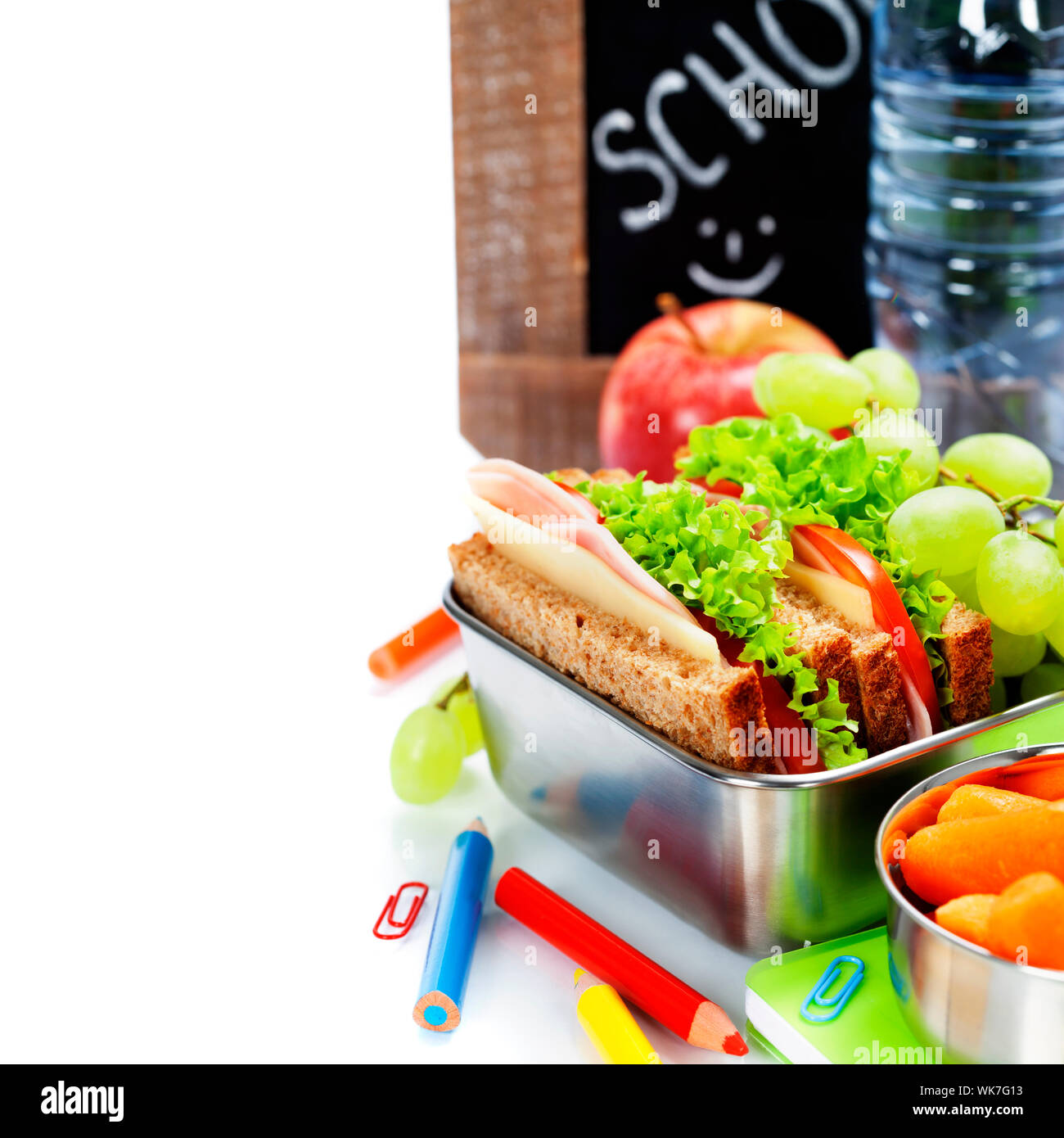school lunch and blank chalk board over white Stock Photo - Alamy