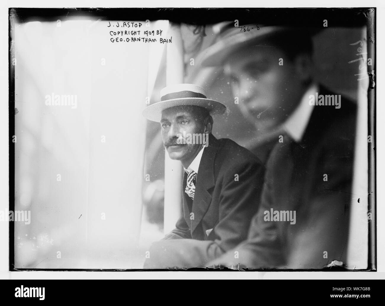 J.J. Astor, leaning from train window Stock Photo - Alamy