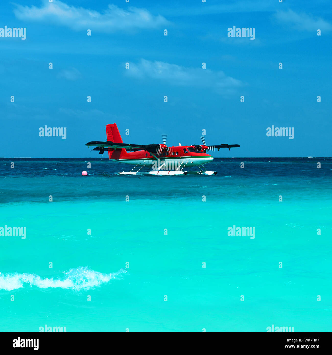 Twin otter red seaplane at Maldives Stock Photo - Alamy