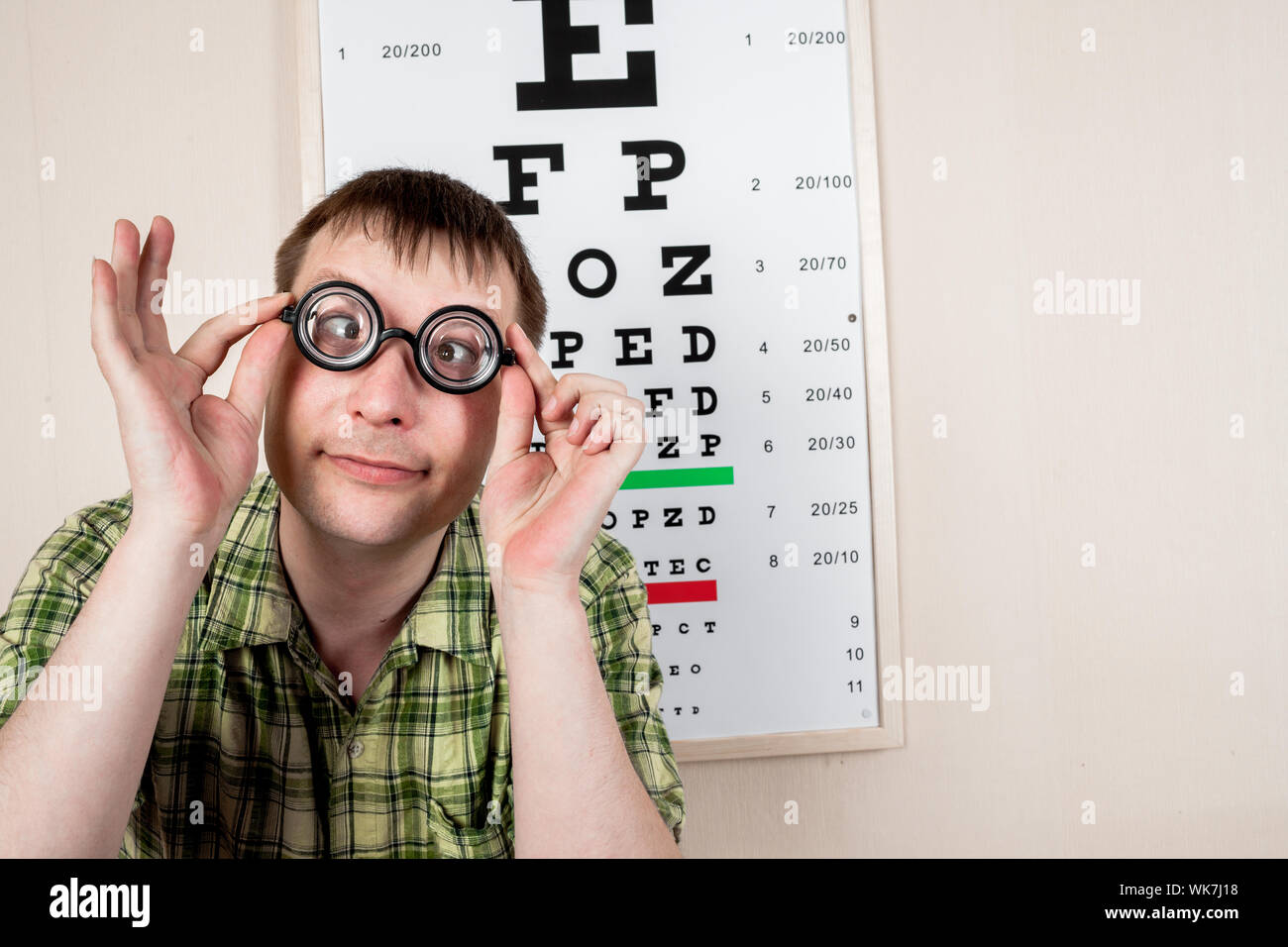 Funny man wearing spectacles in hi-res stock photography and images - Alamy