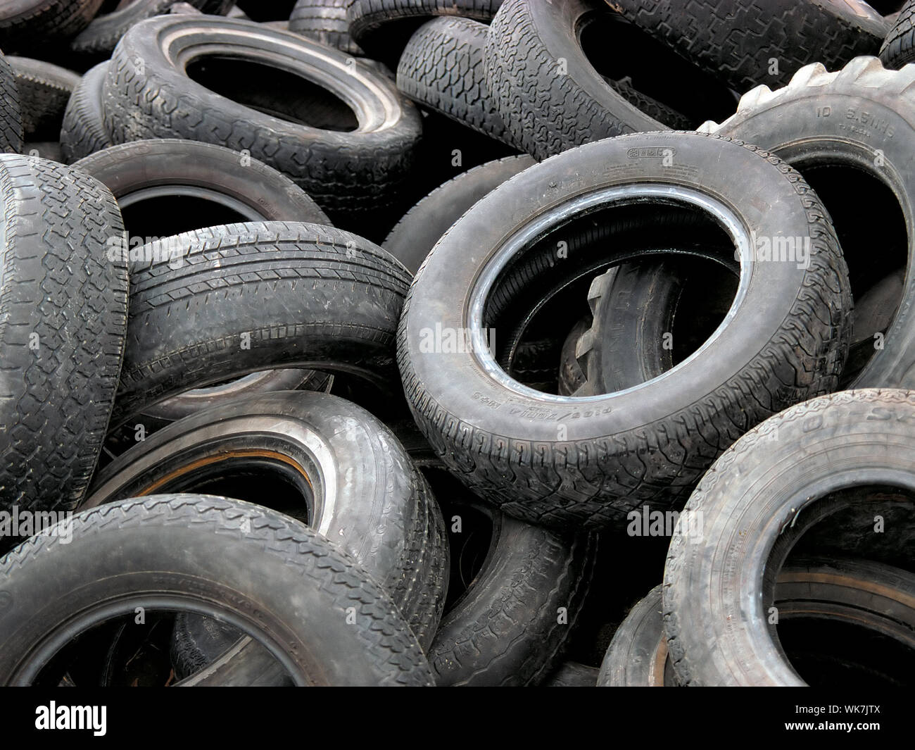 Too many tires Stock Photo - Alamy