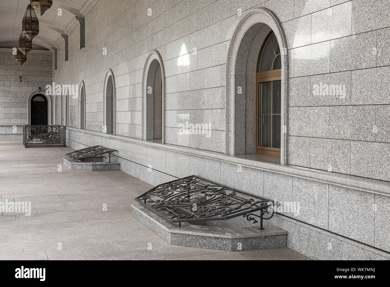 Gallery designed with grey shiny granite tile with windows Stock Photo ...