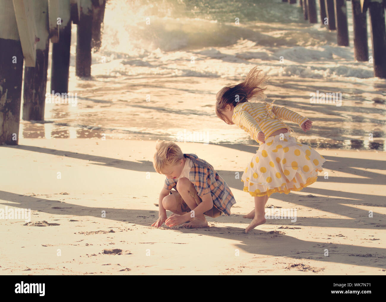 Children playing with sand hi-res stock photography and images - Alamy