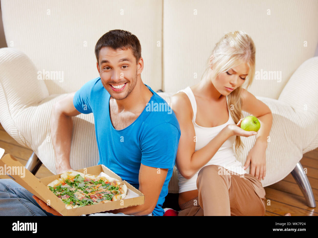 bright picture of couple eating different food Stock Photo - Alamy